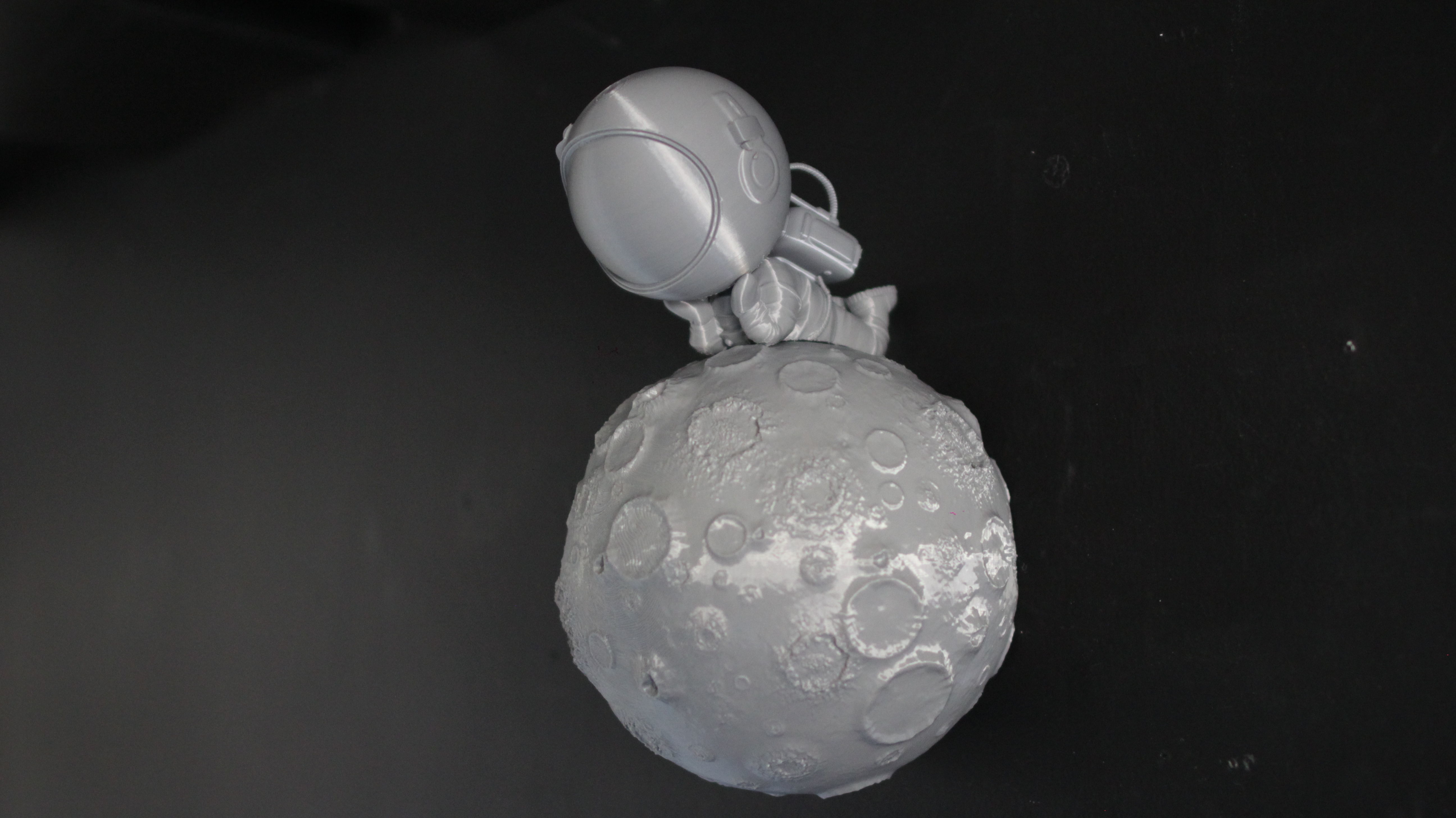 CUTE CHIBI SPACEMAN LYING ON MOON 3D PRINT MODEL 3D model 3D printable ...